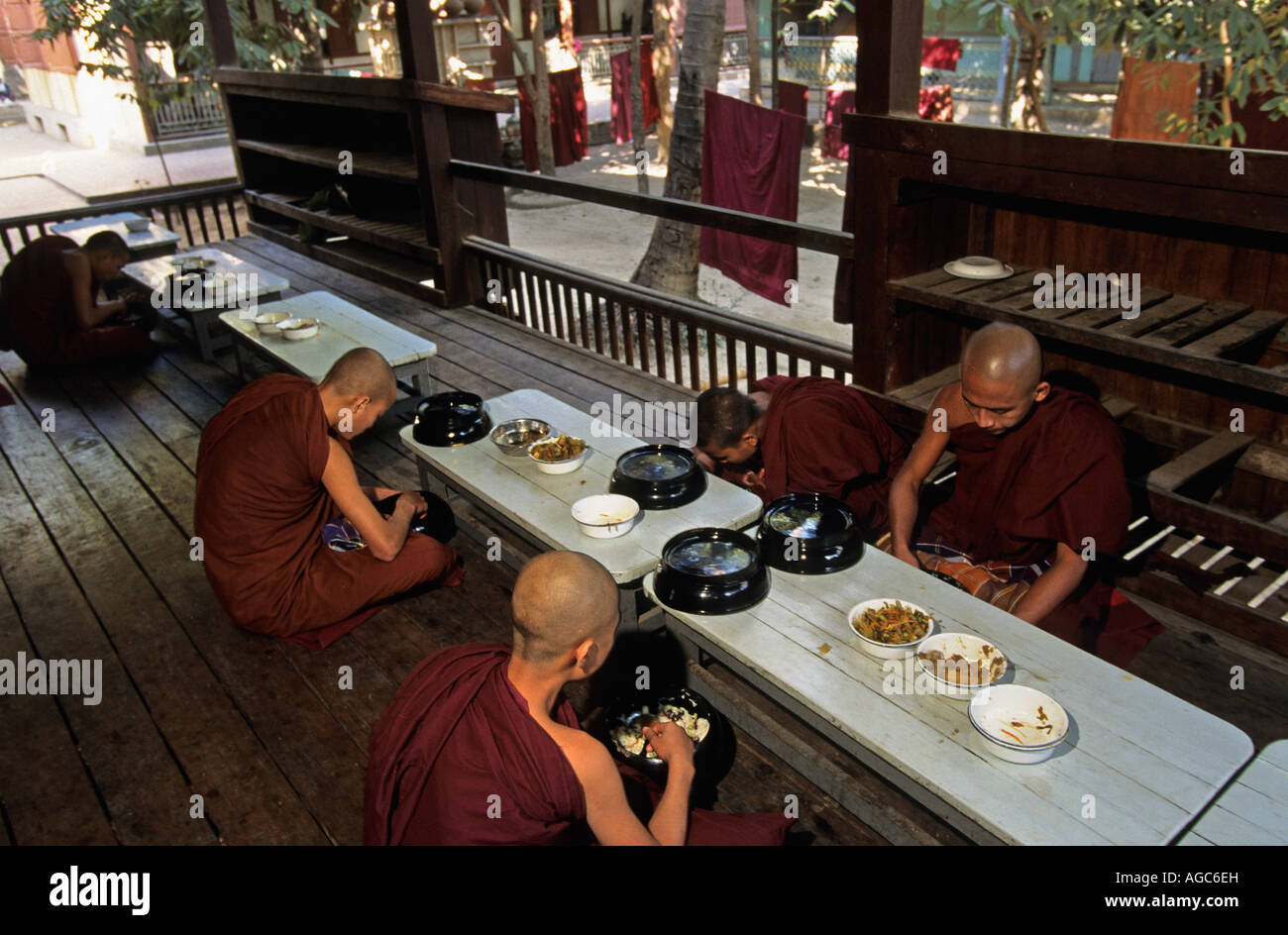 Monk eating at table hi-res stock photography and images - Alamy