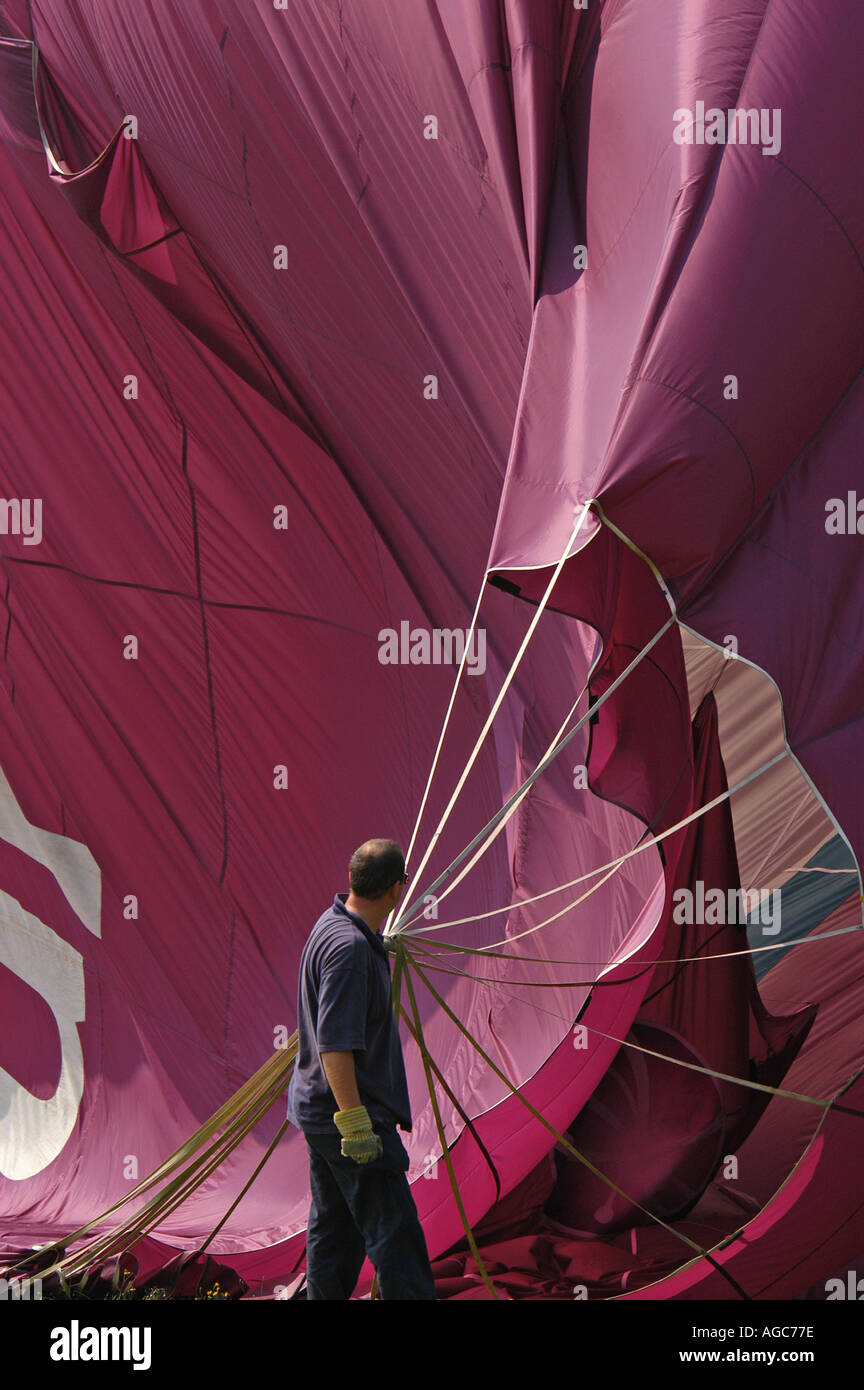 Pulling down a hot air balloon Stock Photo - Alamy