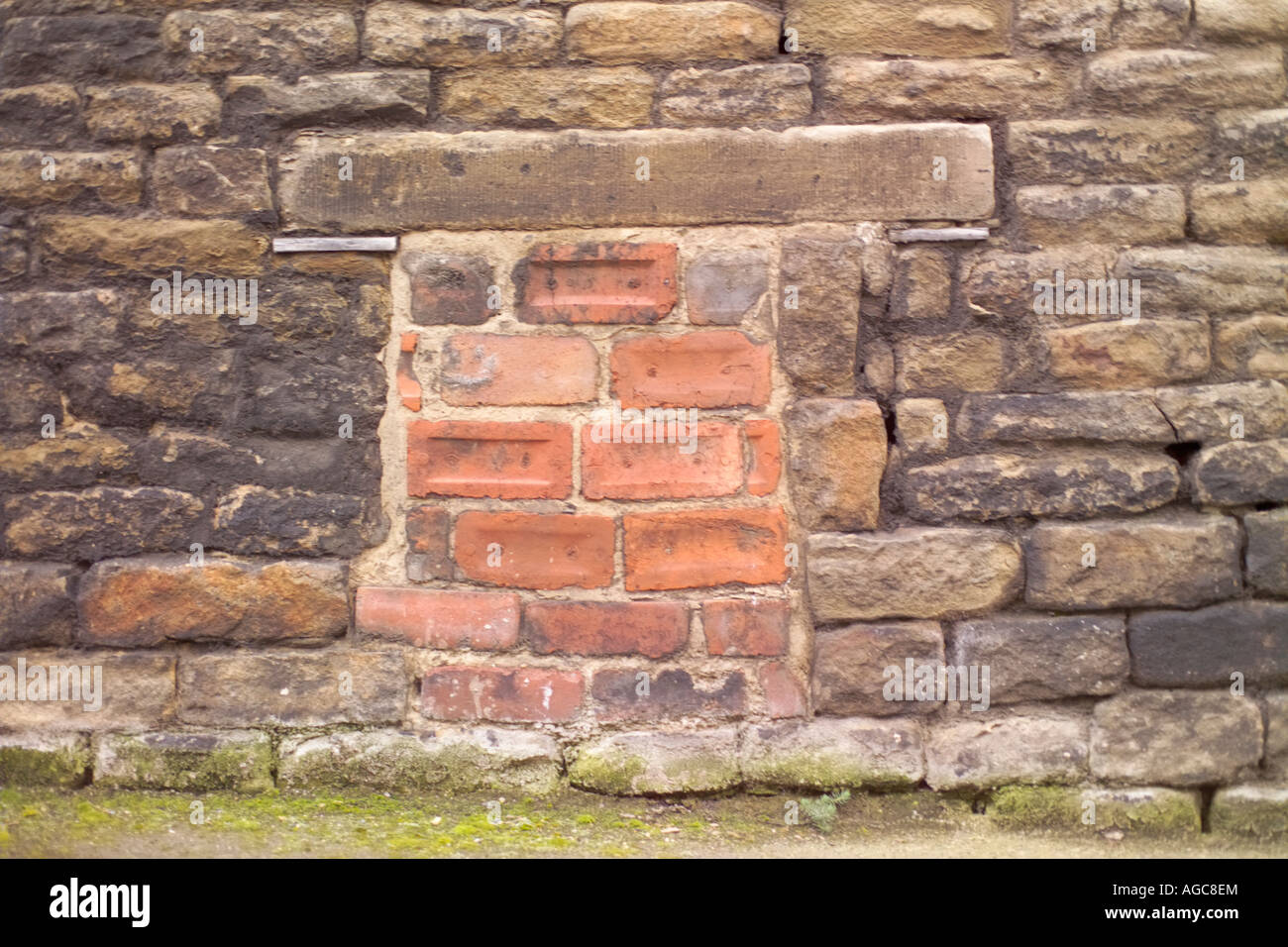 stone wall bricked up Stock Photo - Alamy