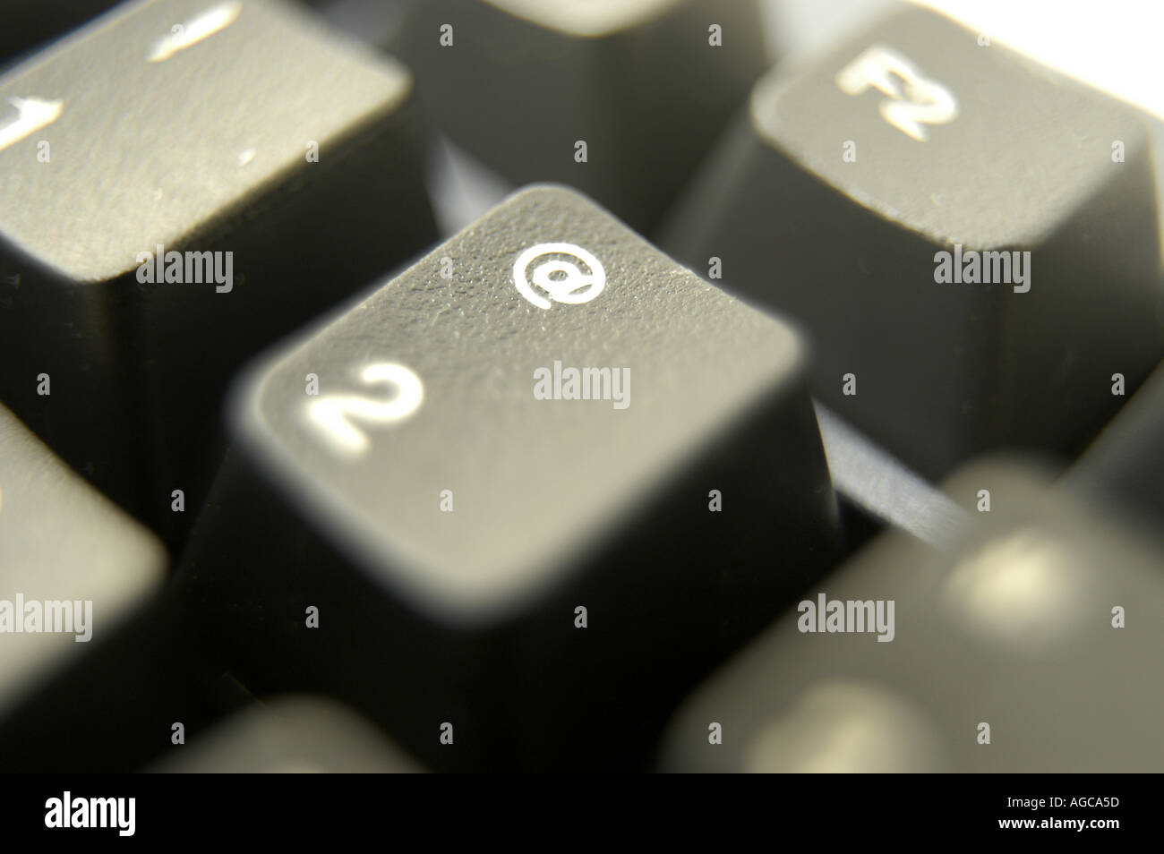 Black computer keyboard number 2 keys close up Stock Photo - Alamy