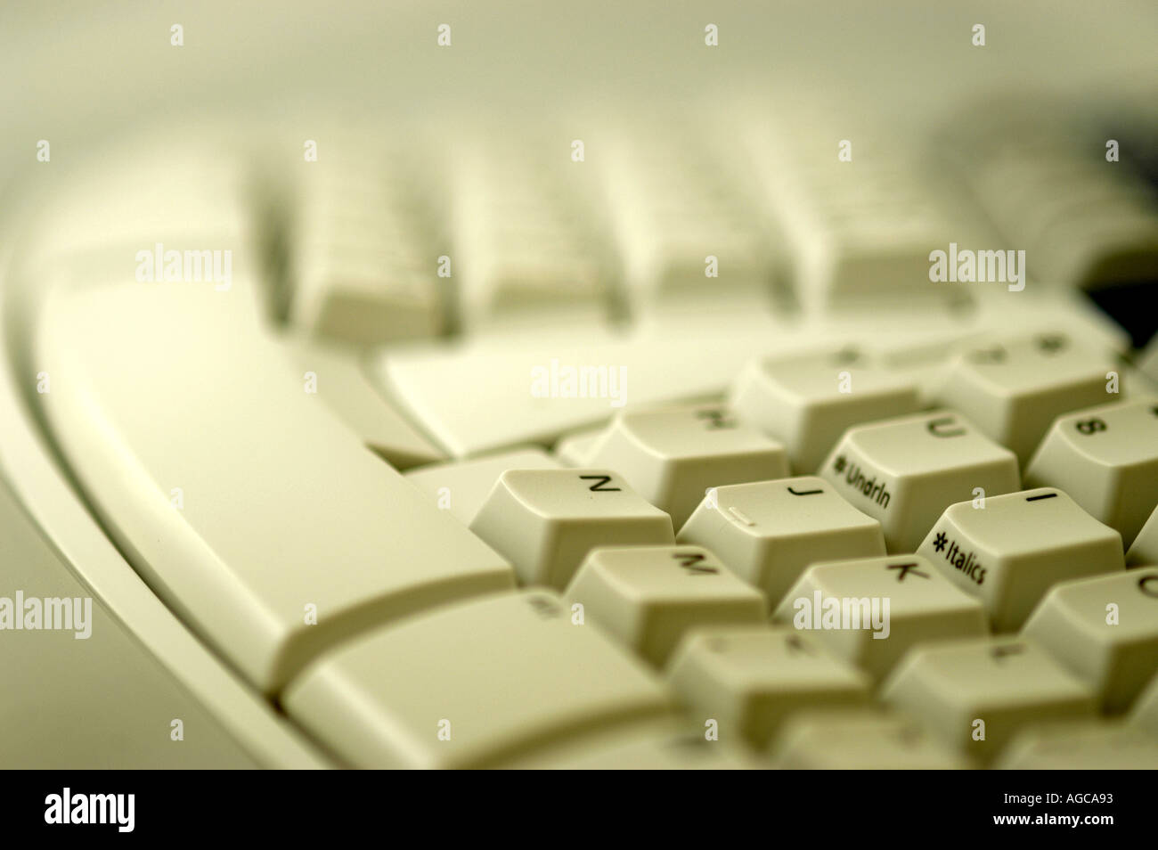 White computer keyboard curvy Stock Photo - Alamy