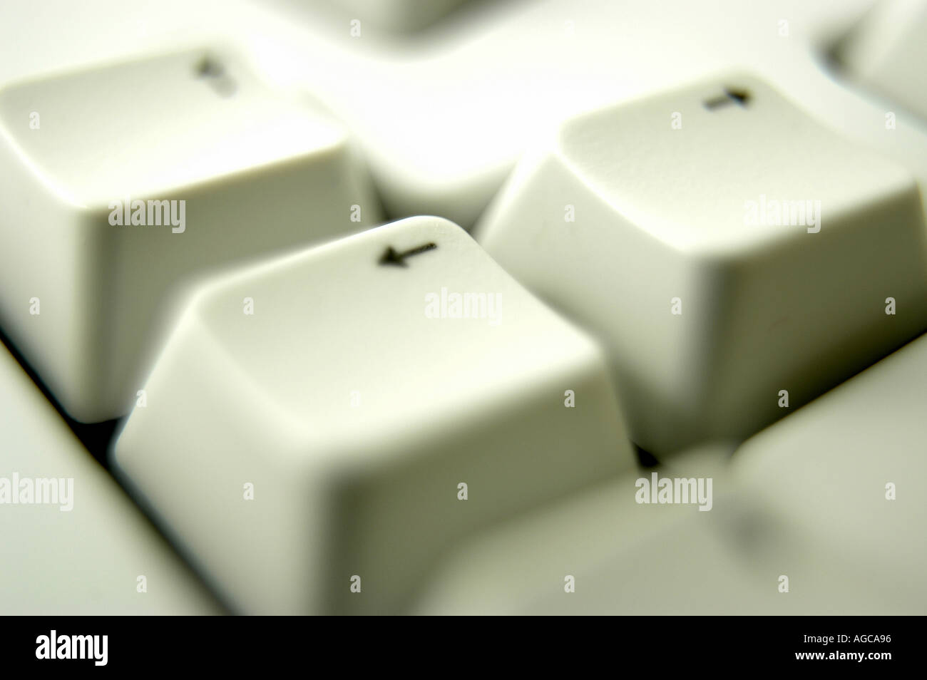 White computer keyboard arrow move keys Stock Photo - Alamy