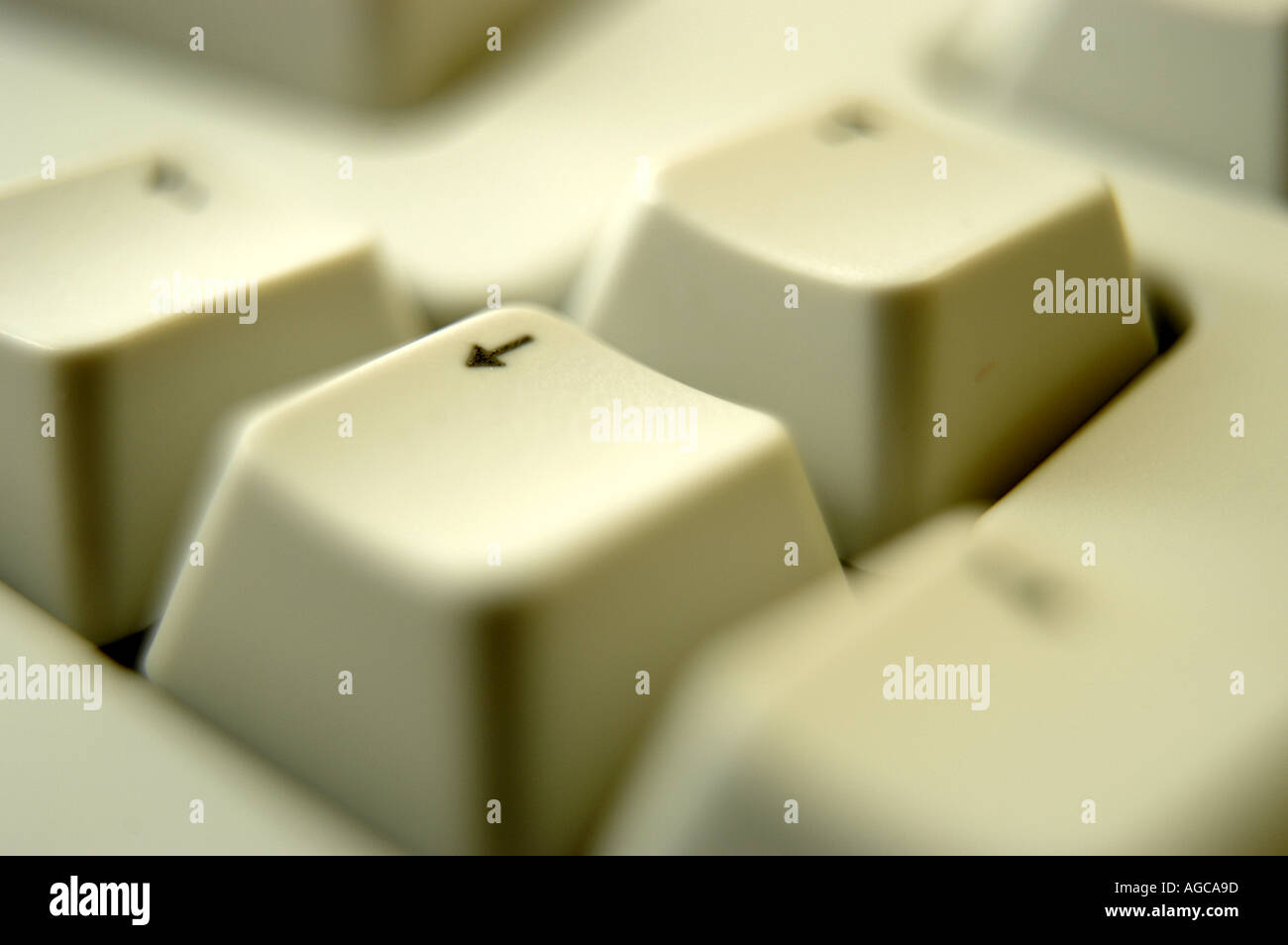 White computer keyboard arrow move keys Stock Photo - Alamy
