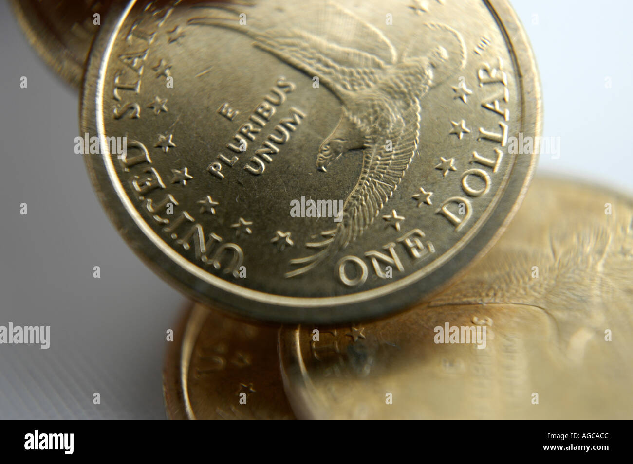 Coins dropping on others overlapping horizontal Stock Photo - Alamy