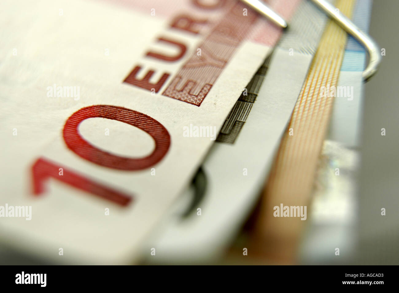 10 ten euro notes paper clip horizontal Stock Photo - Alamy