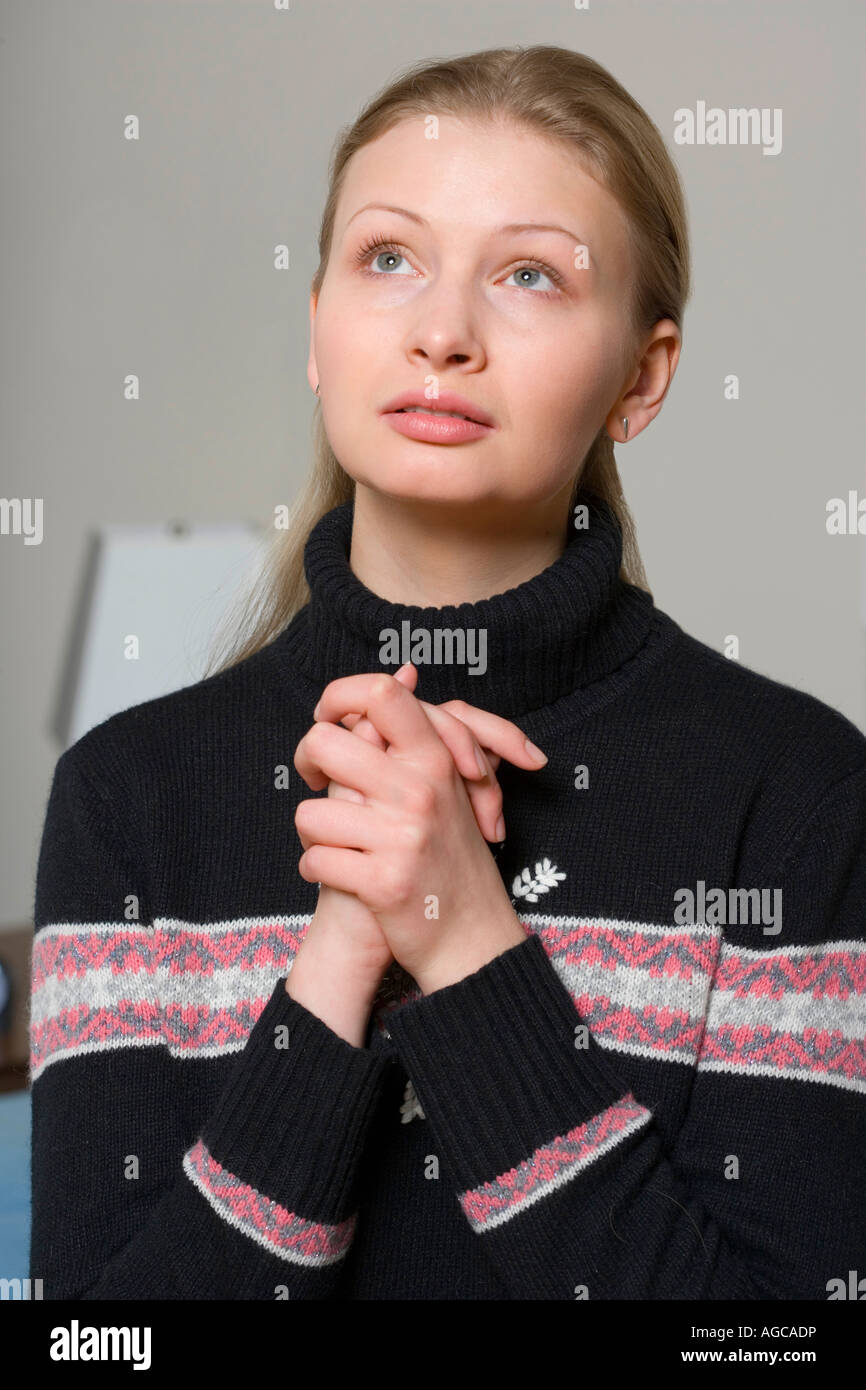 Woman looking up, praying Stock Photo - Alamy