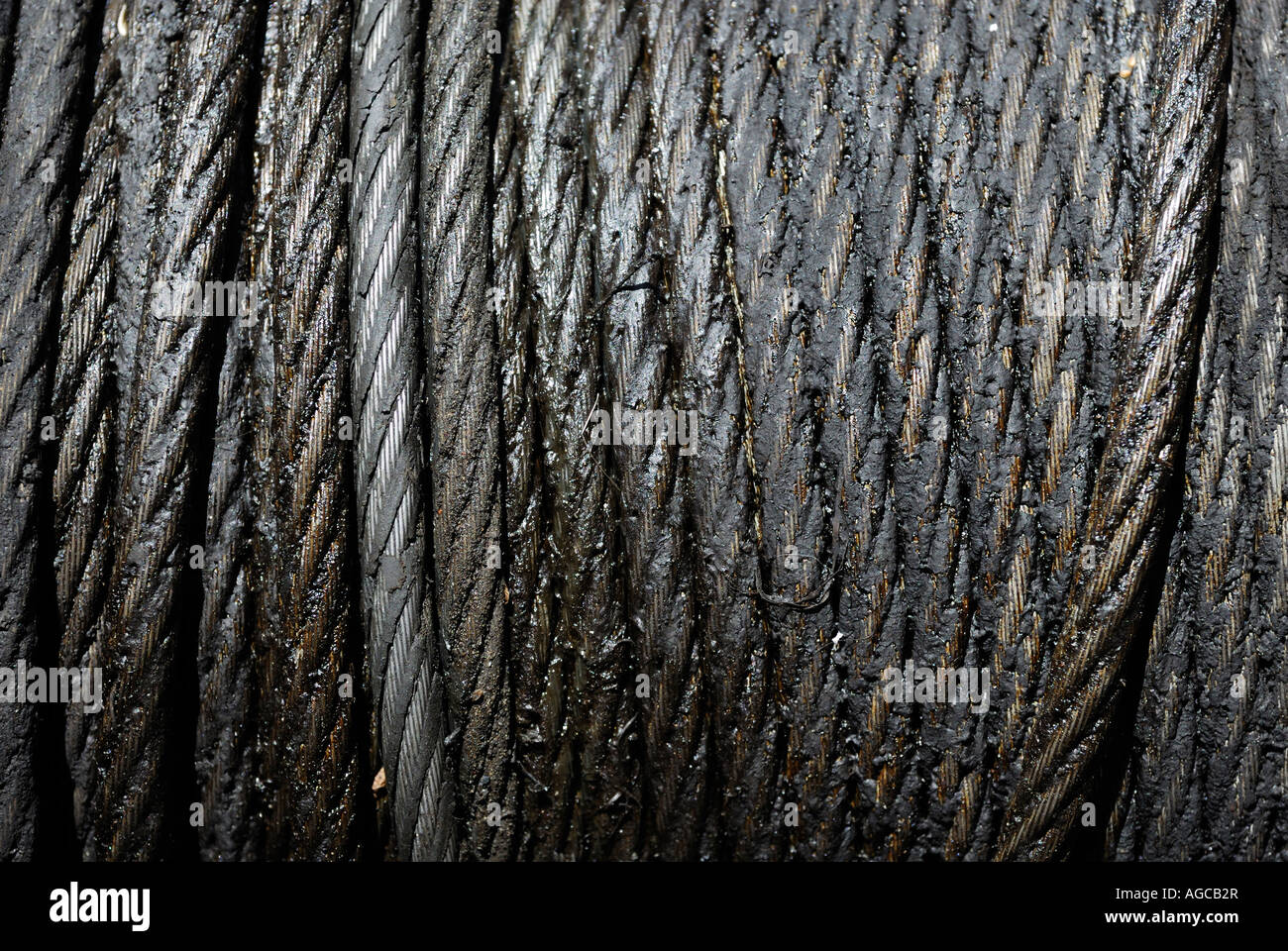 Greased Steel Cable prevent corrosion via oil Stock Photo - Alamy