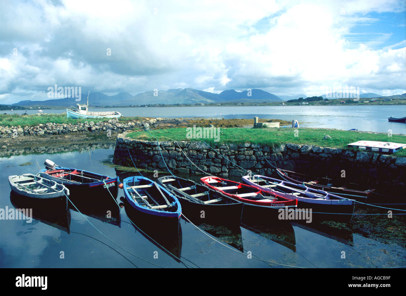 Europe Ireland Galway Connemara Roundstone harbor boats curragh in the ...