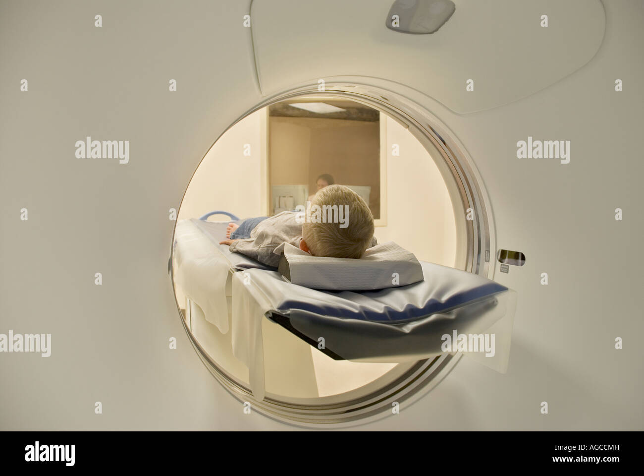 Young boy having CAT scan in hospital scanning suite Stock Photo - Alamy