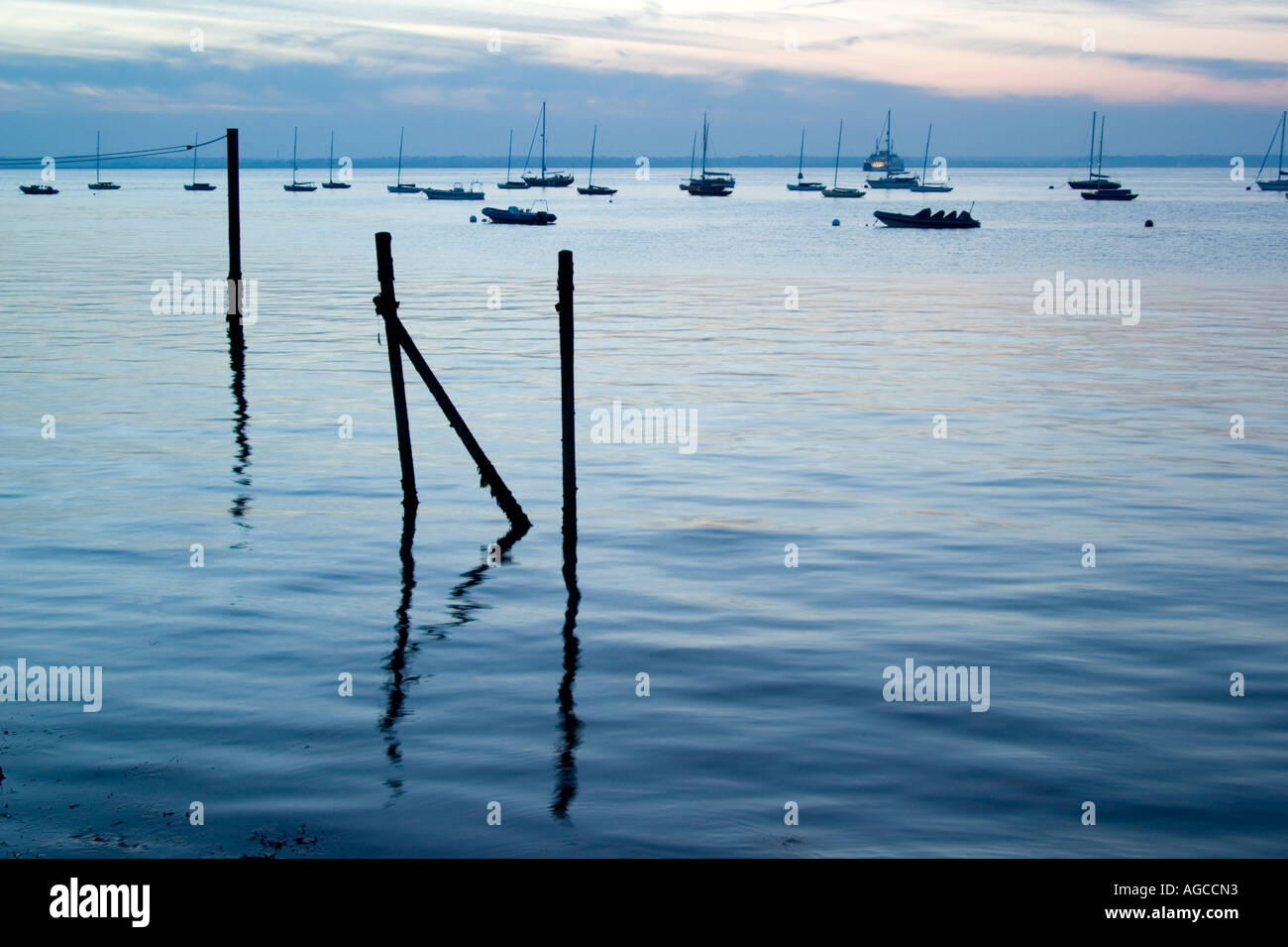 rotten wooden posts twilight yarmouth harbour Yarmouth Isle of Wight ...