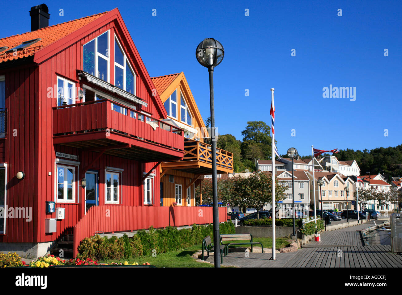 colourful wooden houses at the harbour of Grimstad in the South of ...