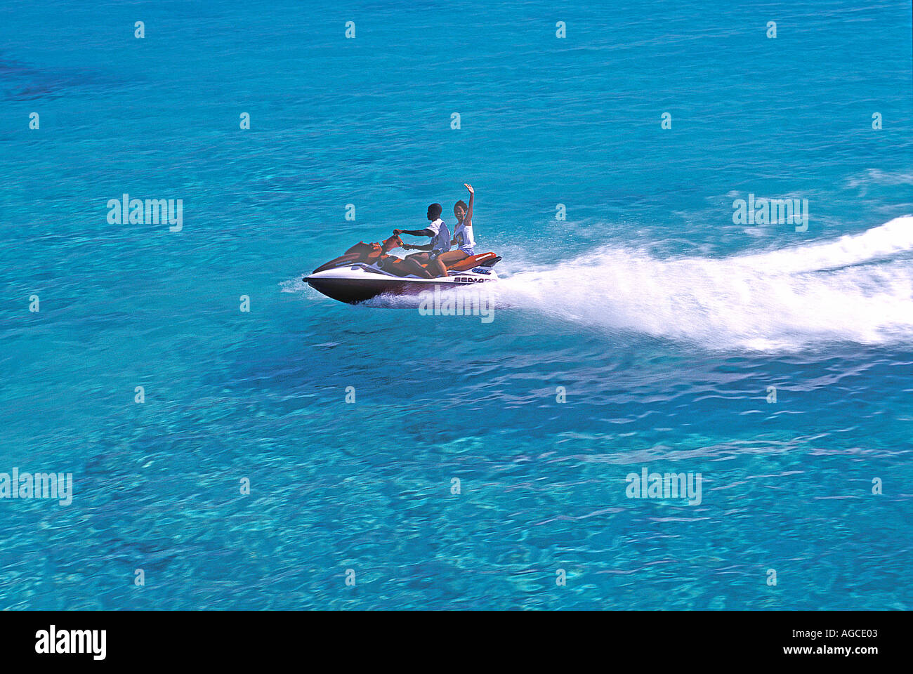 Jet Ski Fun in the tropics Stock Photo - Alamy