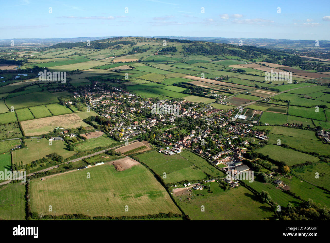 Aerial shot of Eckington village with Bredon Hill in the background ...