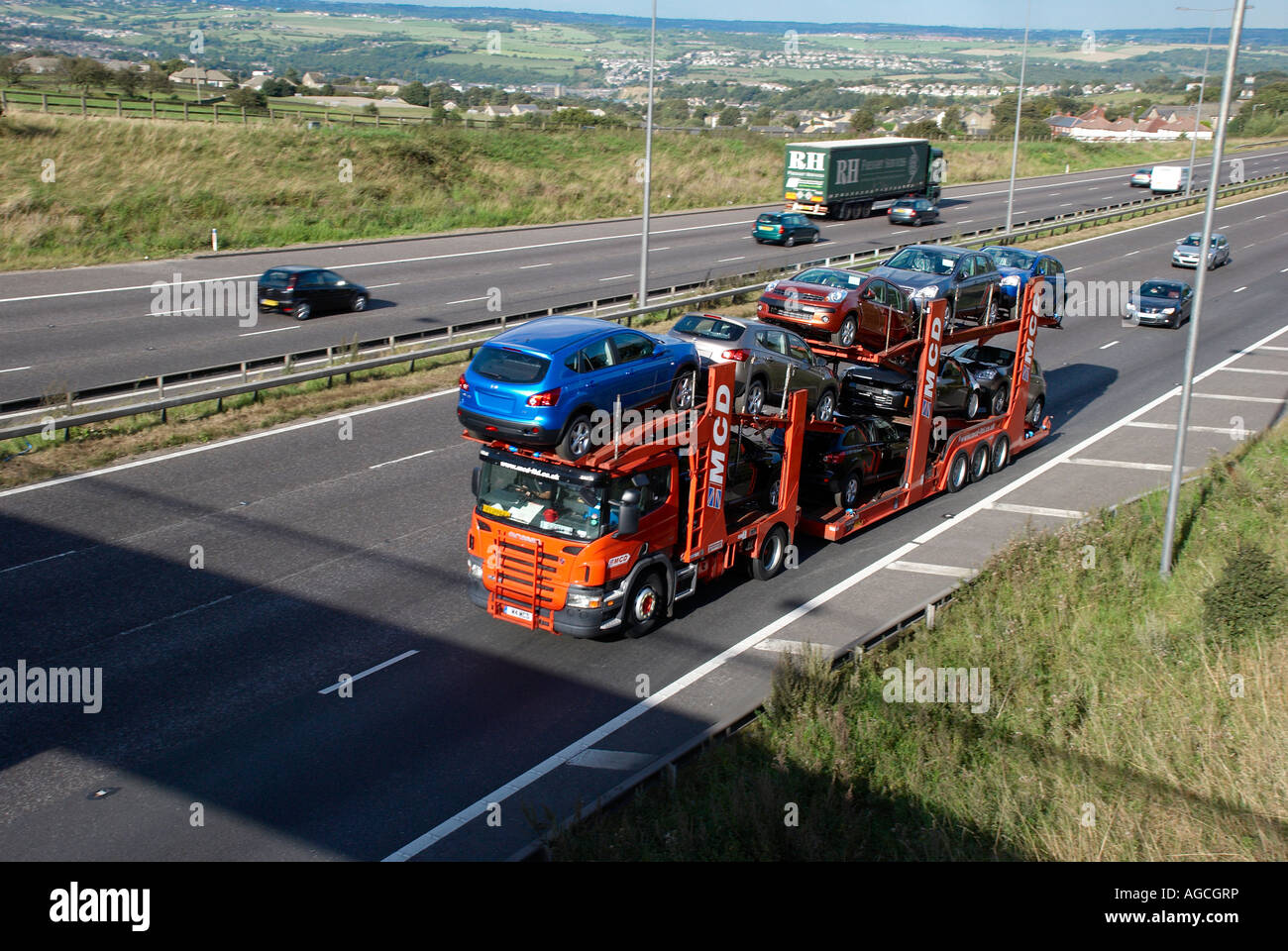 car transporter on motorway Stock Photo - Alamy