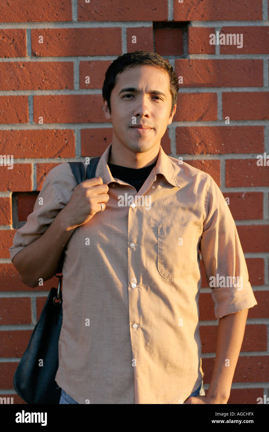 Slung over shoulder hi-res stock photography and images - Alamy