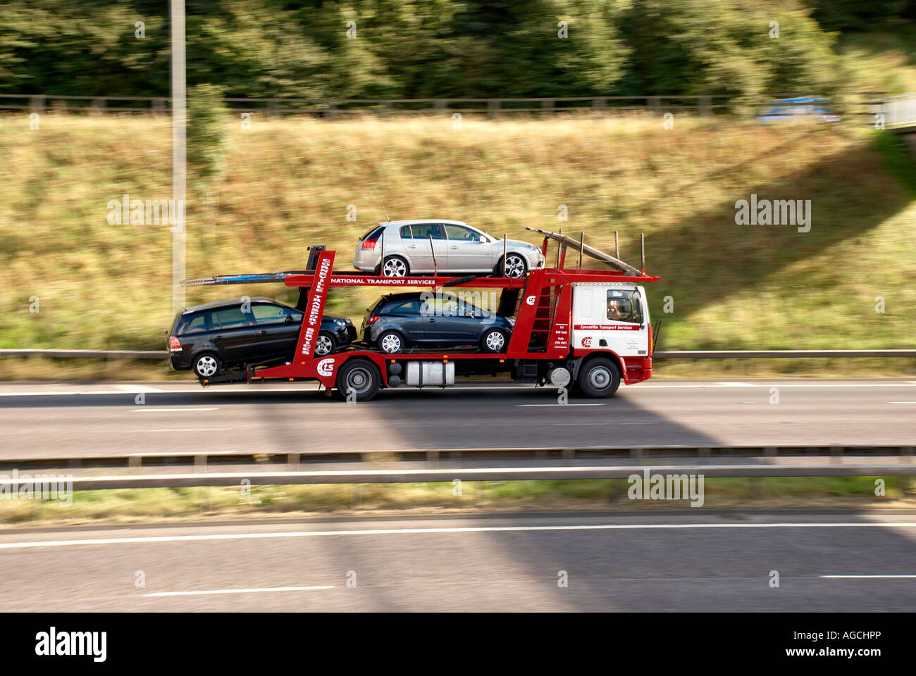 small car transporter on the motorway Stock Photo - Alamy