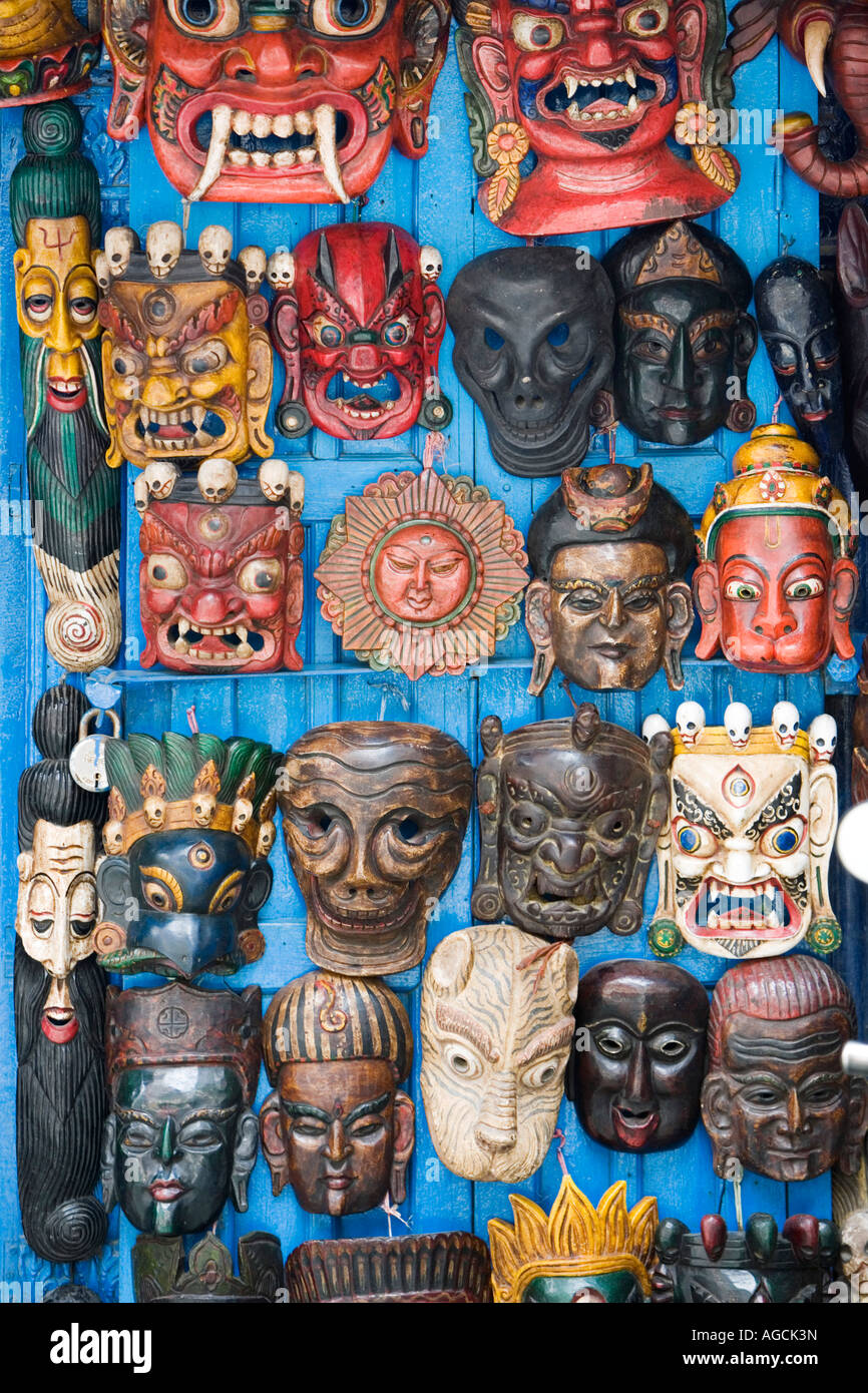 Colourful wooden Carved masks on a blue door. Kathmandu, Nepal Stock ...