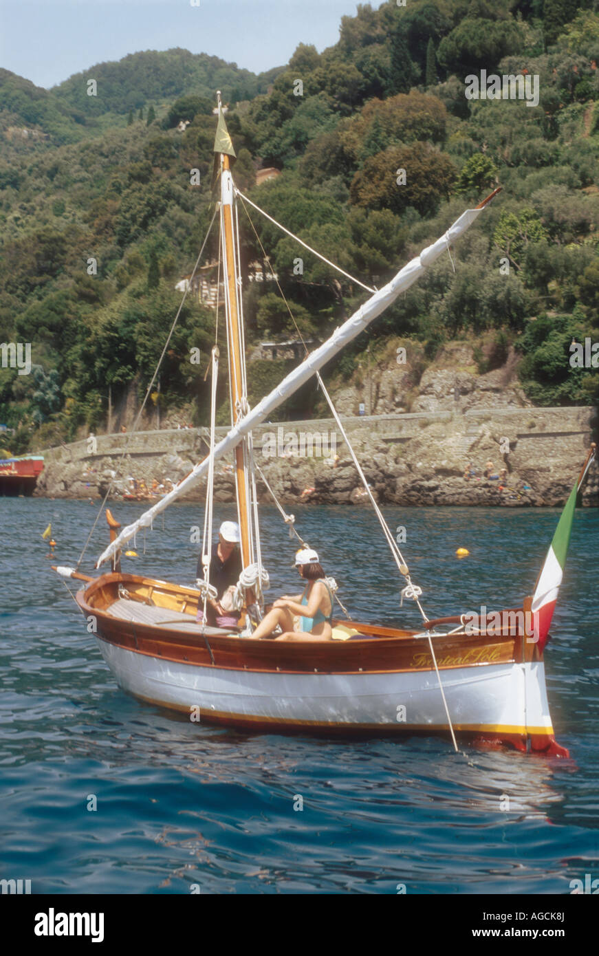 A modern but traditionally styled gozzo lateen rigged sailing boat near ...