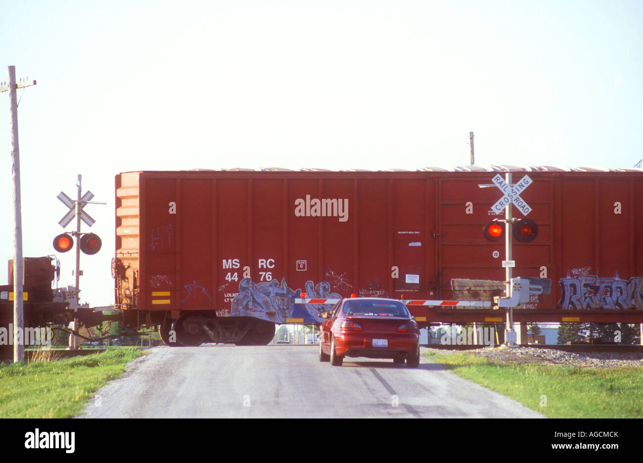 car or auto at a railroad crossing Stock Photo - Alamy