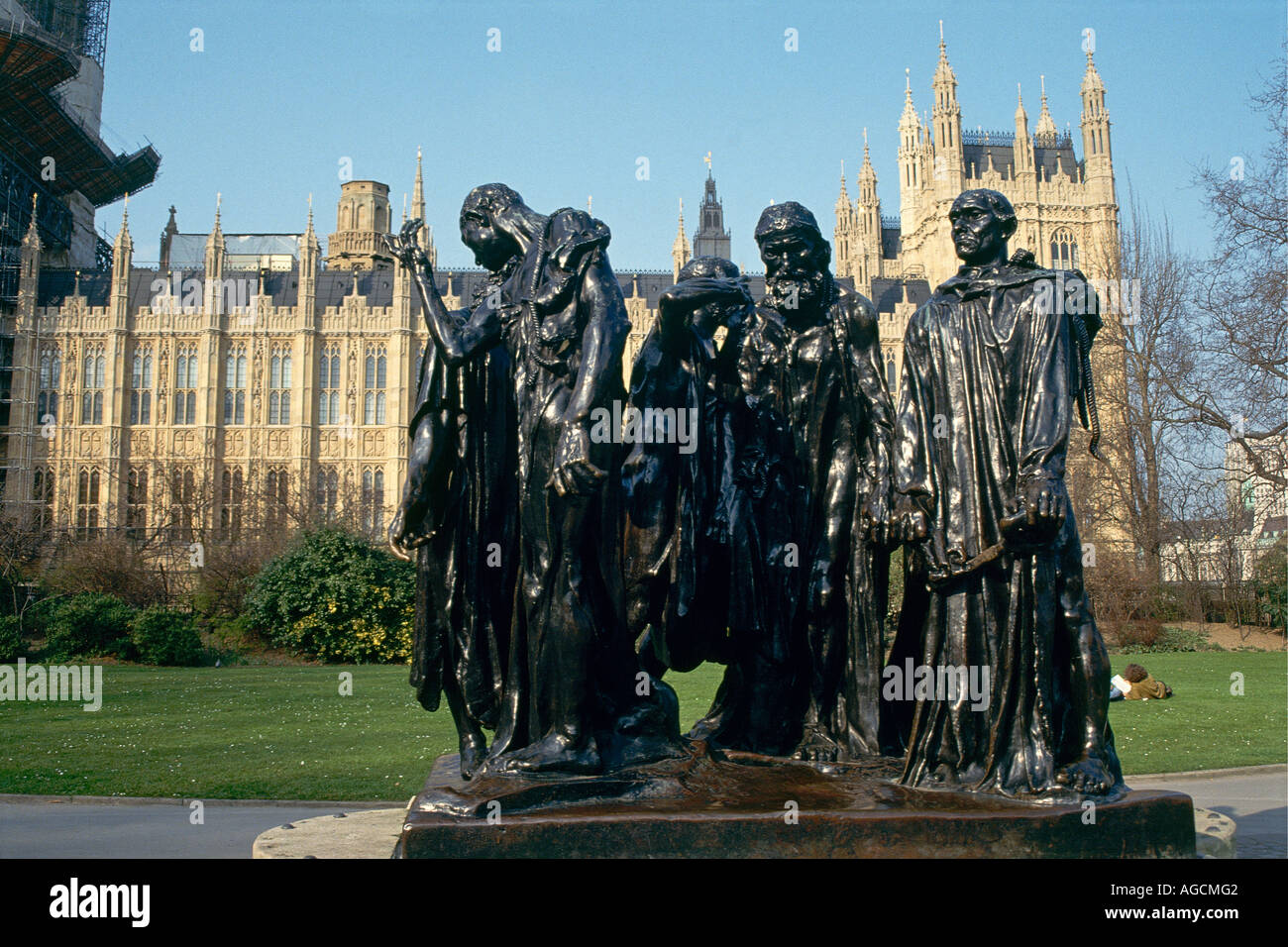 Statues of the Burghers of Calais stand in Parliament Square behind the ...