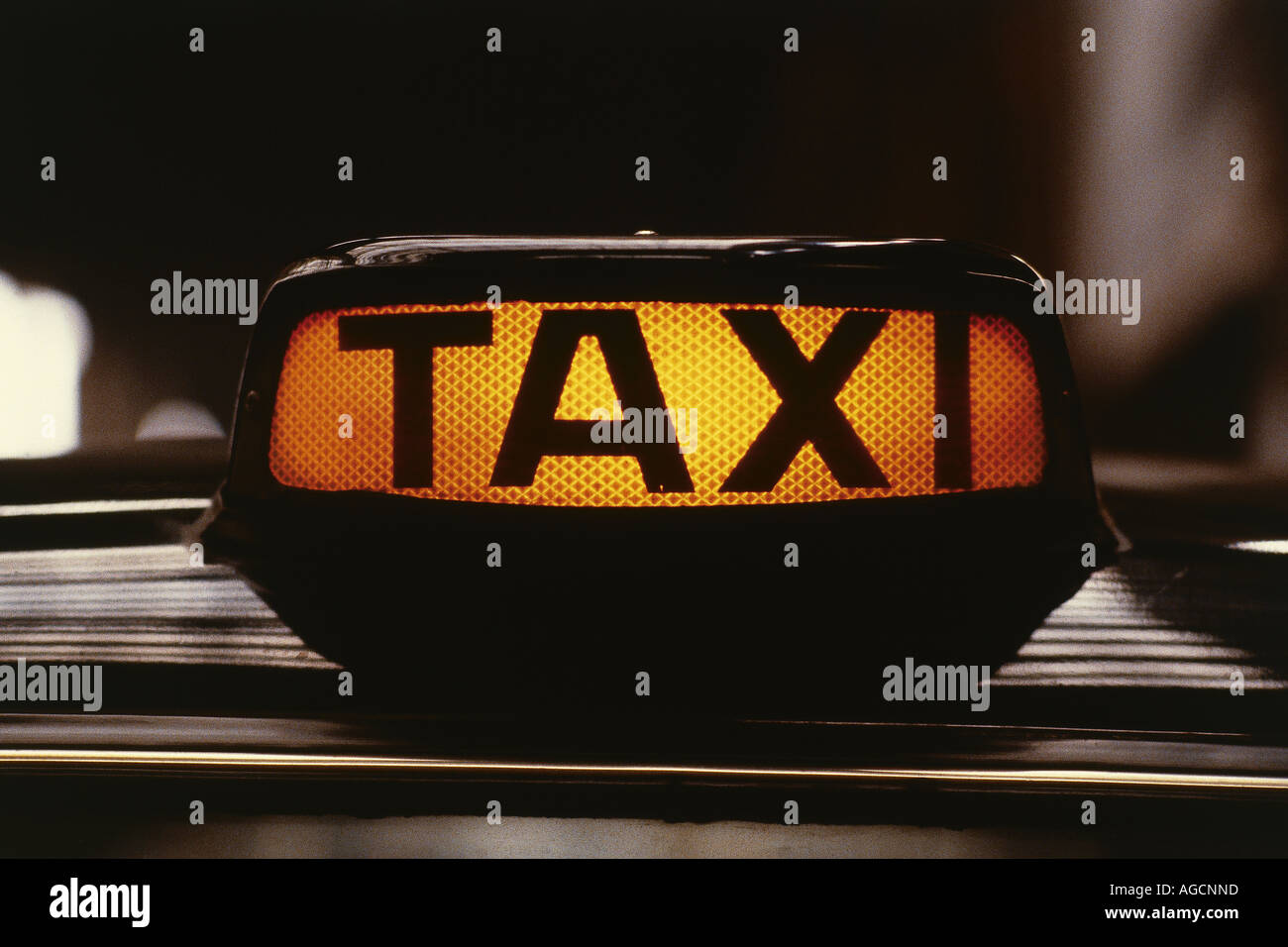 A Taxi sign lit up at Liverpool Street Station Stock Photo - Alamy