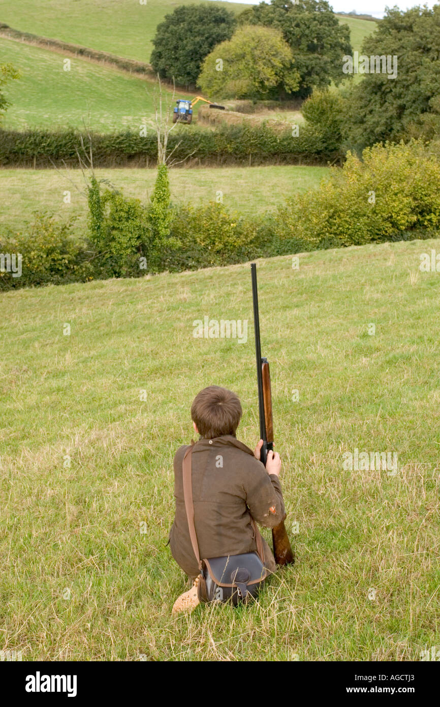 Young lad with rifle Stock Photo - Alamy