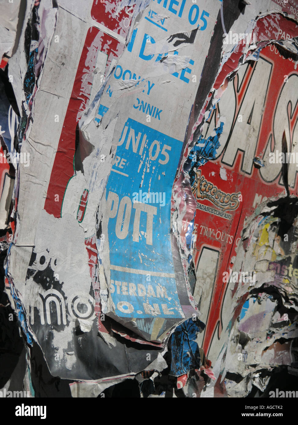 Old torn posters on a wall in amsterdam Stock Photo - Alamy