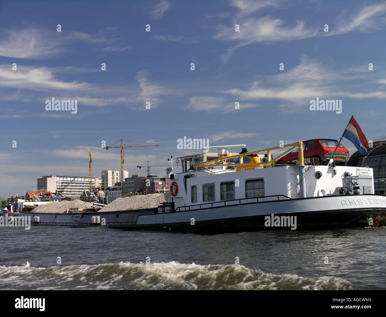 Dutch Cargo Ship on the river Amstel Stock Photo - Alamy
