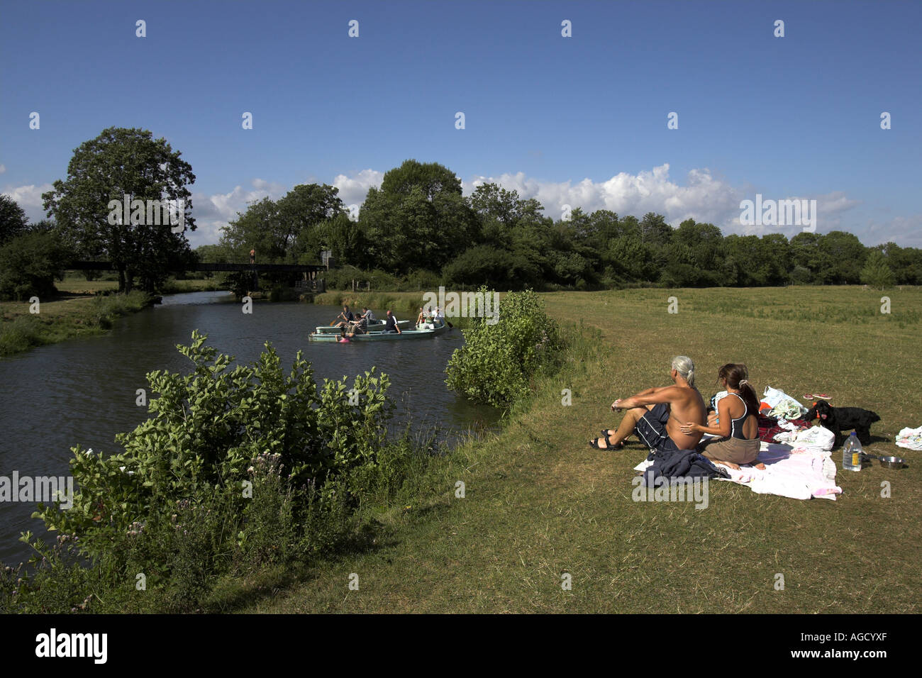 People enjoying a Sunday afternooons boating at Barcombe Mills, Sussex ...