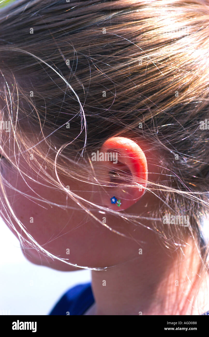 young girl head and ear Stock Photo - Alamy
