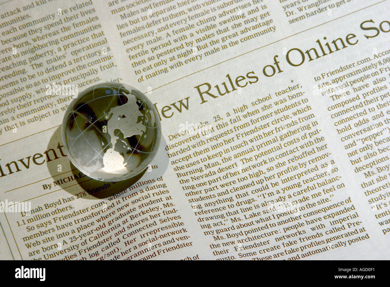 earth on newspaper Stock Photo - Alamy