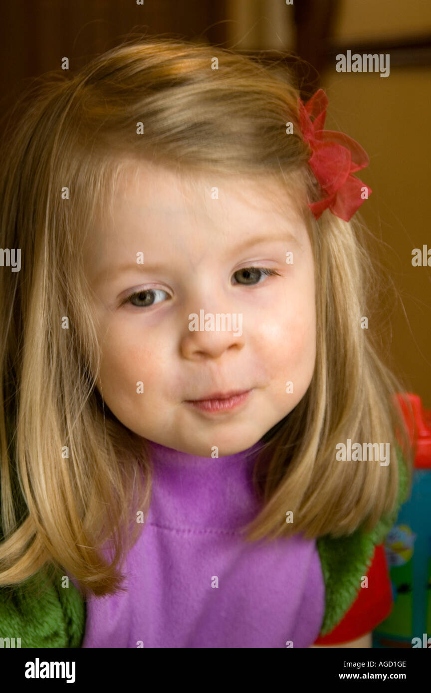 Little girl shows an expression of knowing Stock Photo - Alamy
