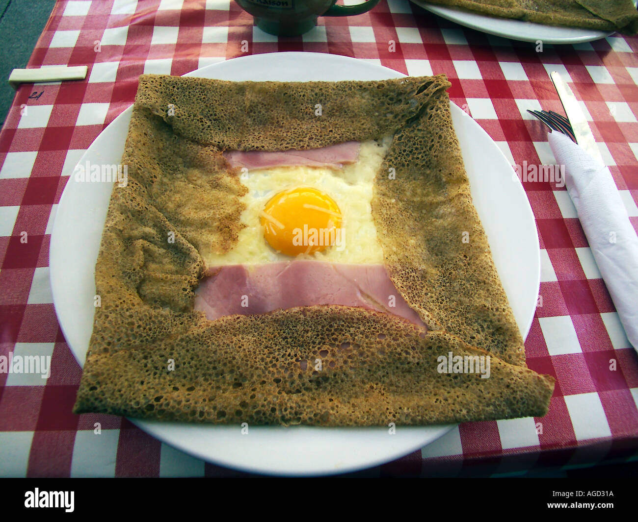 Typical pancake lunch at out door restaurant in Josselin in Brittany ...