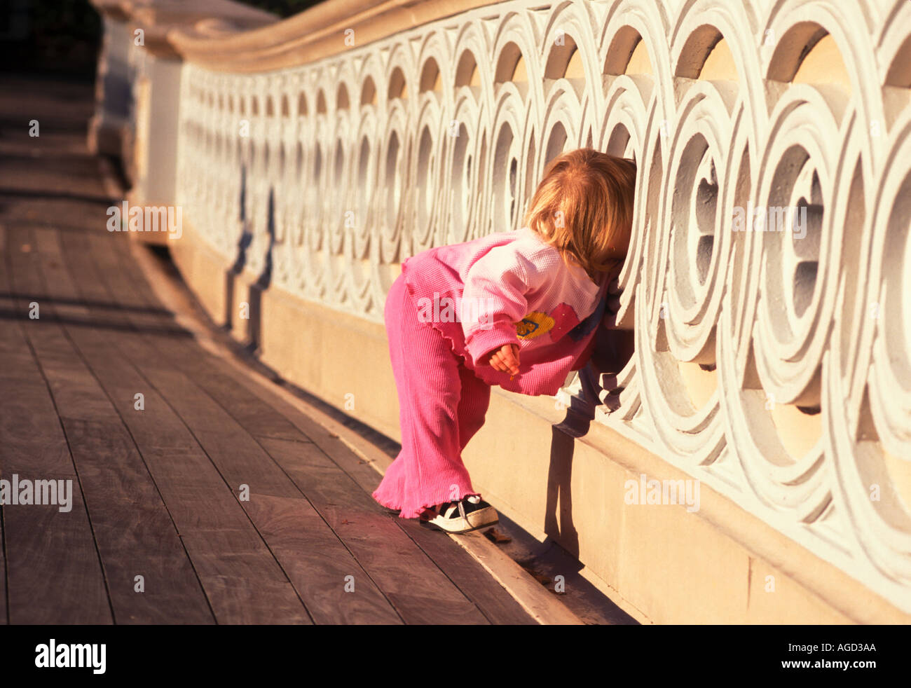 Girl on bridge Stock Photo - Alamy
