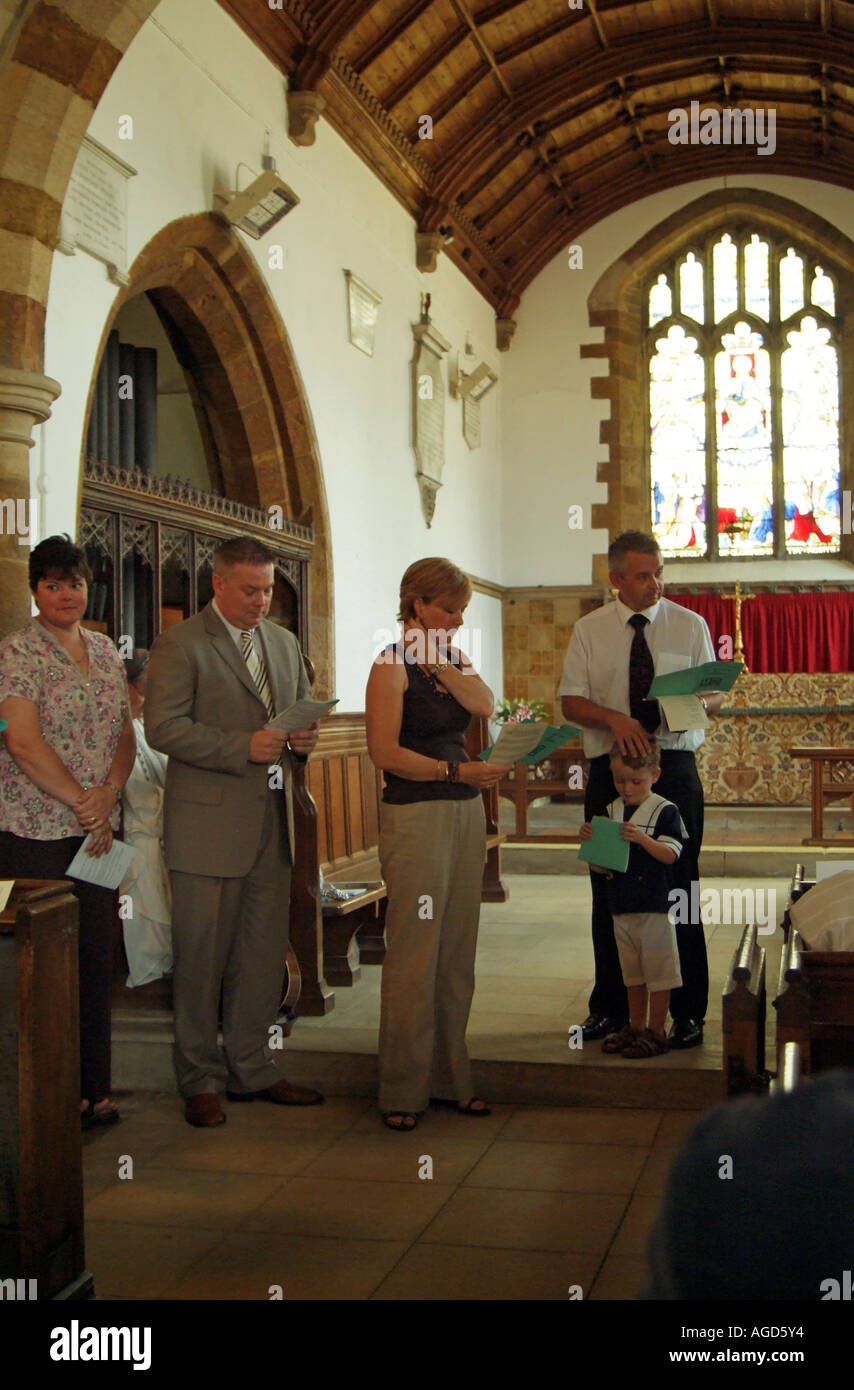 Church christening ceremony hi-res stock photography and images - Alamy