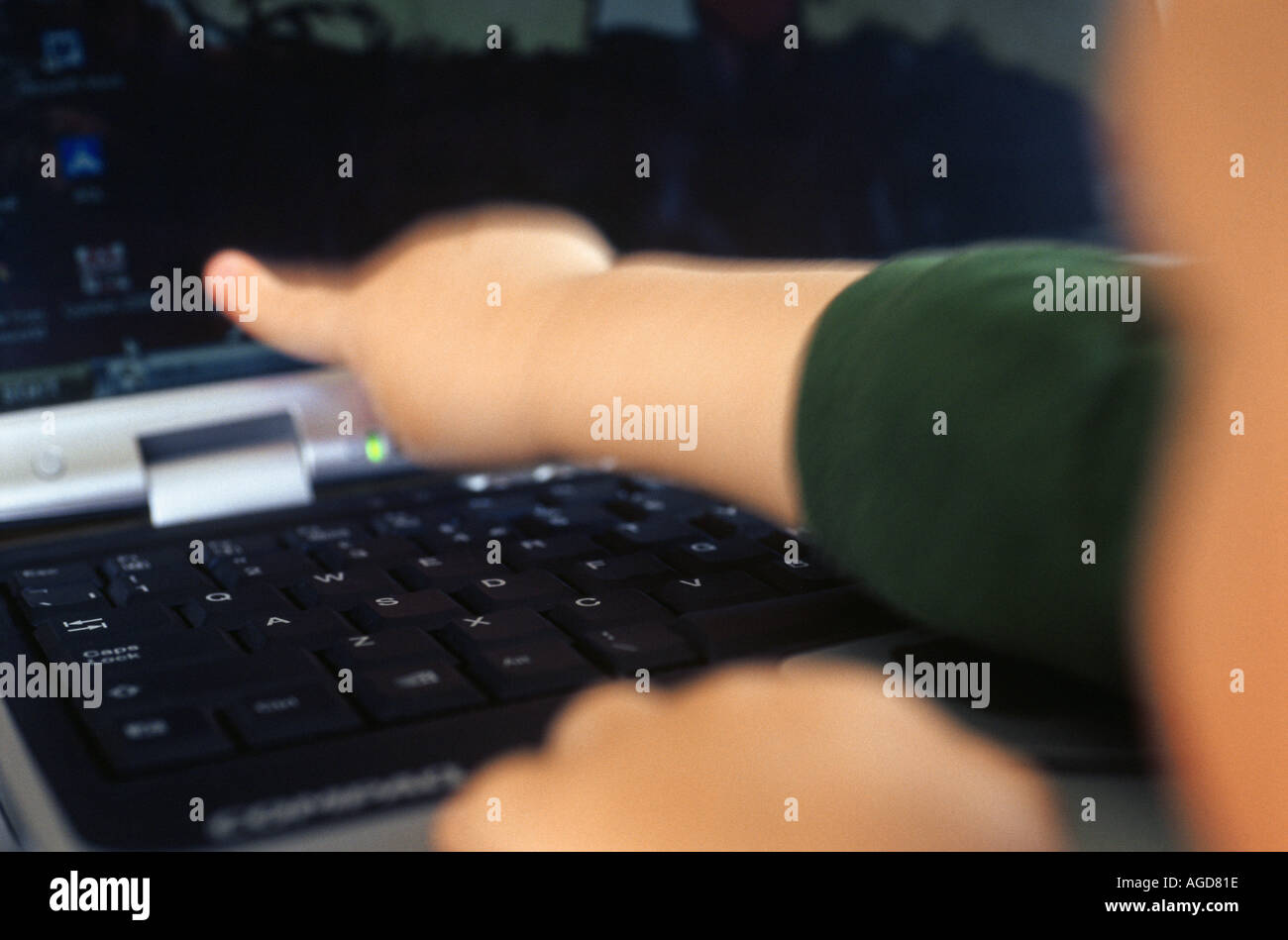 baby pointing to computer screen Stock Photo - Alamy