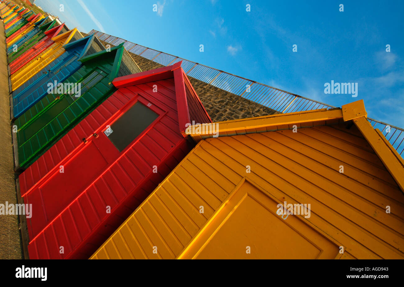 Bright coloured Bathing huts or Beach huts at Whitby North Yorhshire ...