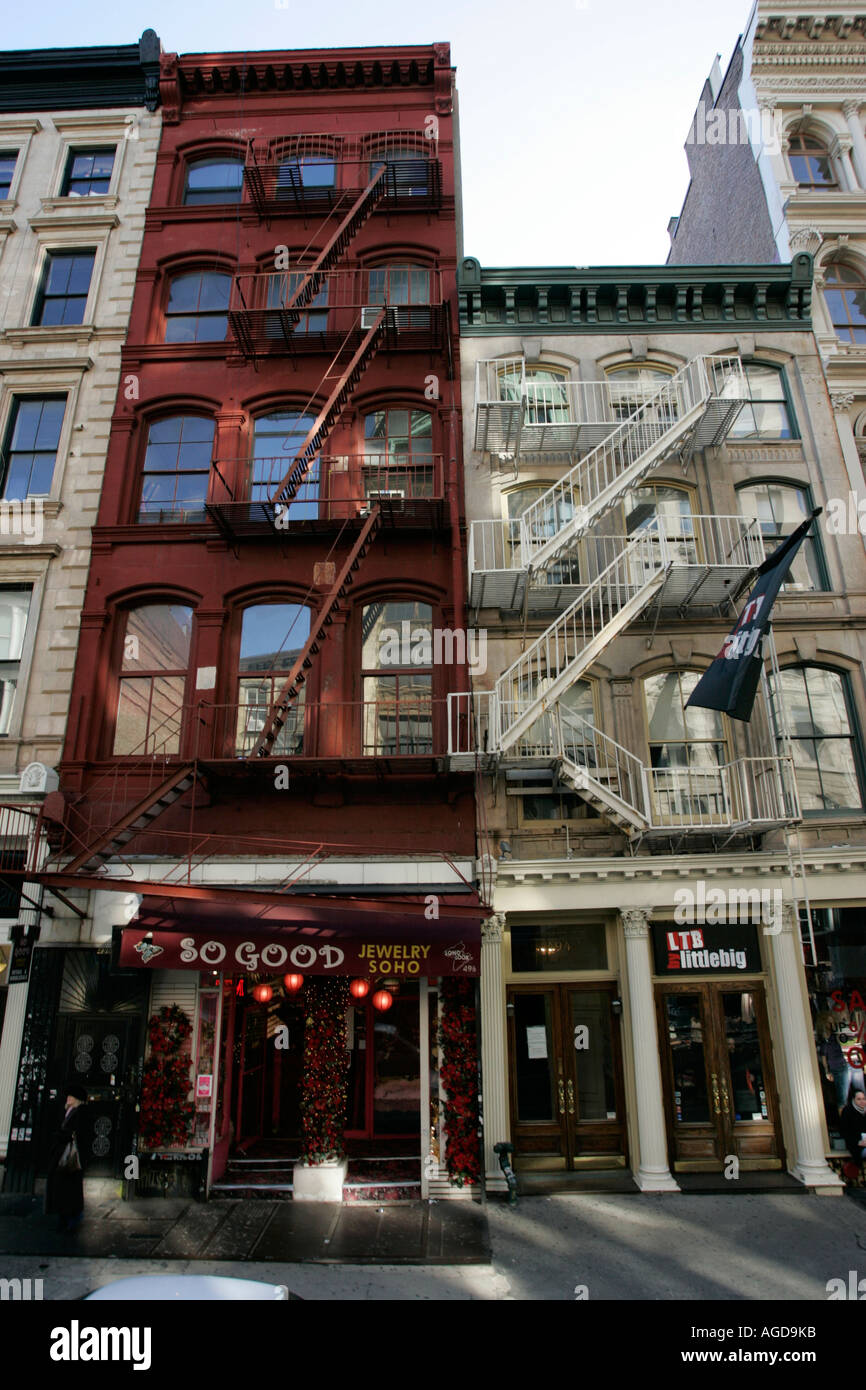 narrow buildings shopfronts with external fire escapes soho new york ...
