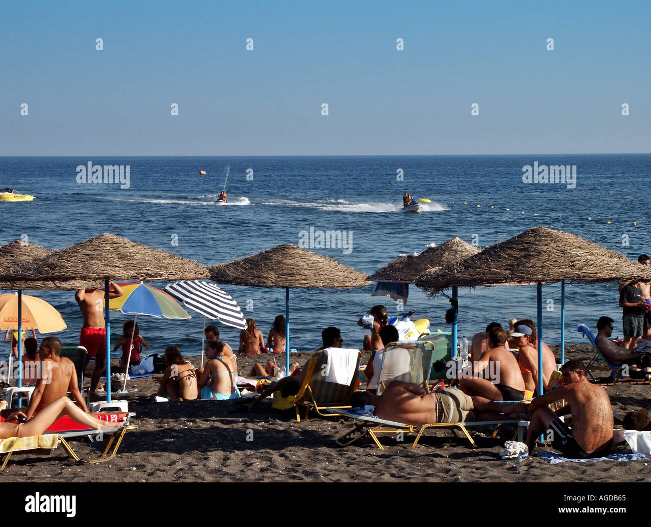 Greek beach people deck chair hi-res stock photography and images - Alamy