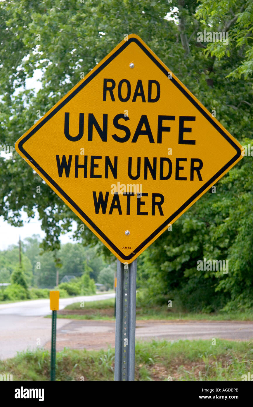 Road unsafe sign water hi-res stock photography and images - Alamy