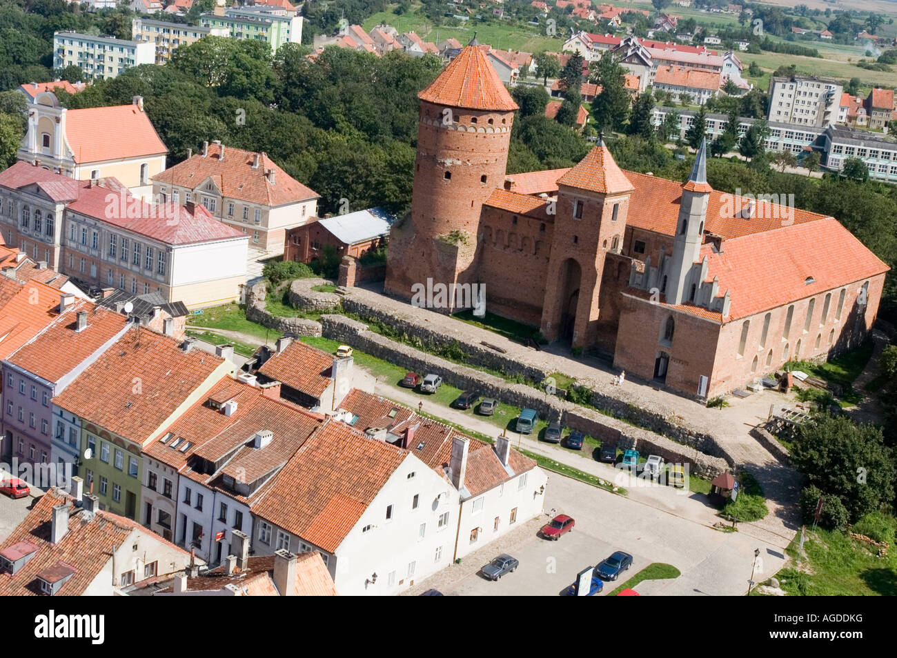 Red tiled rooftops and Teutonic castle in Reszel Rossel Warmia, Poland ...