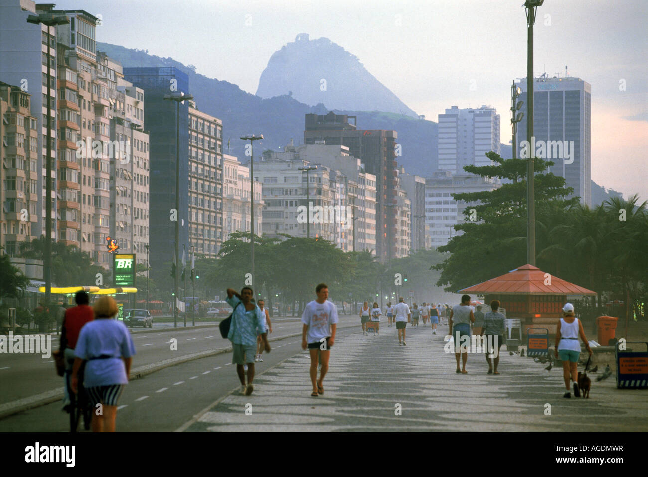 People taking morning walk along Copacabana Beach in Rio de Janeiro ...
