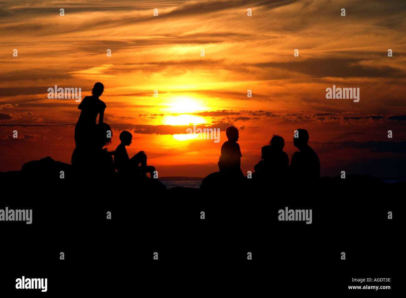 Silhouette people enjoying sunset hi-res stock photography and images ...