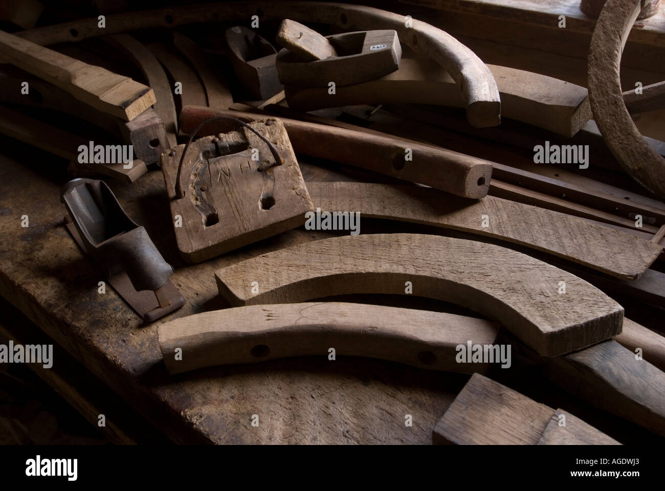 Stock image of tools and wood templates used for making wagon wheels ...
