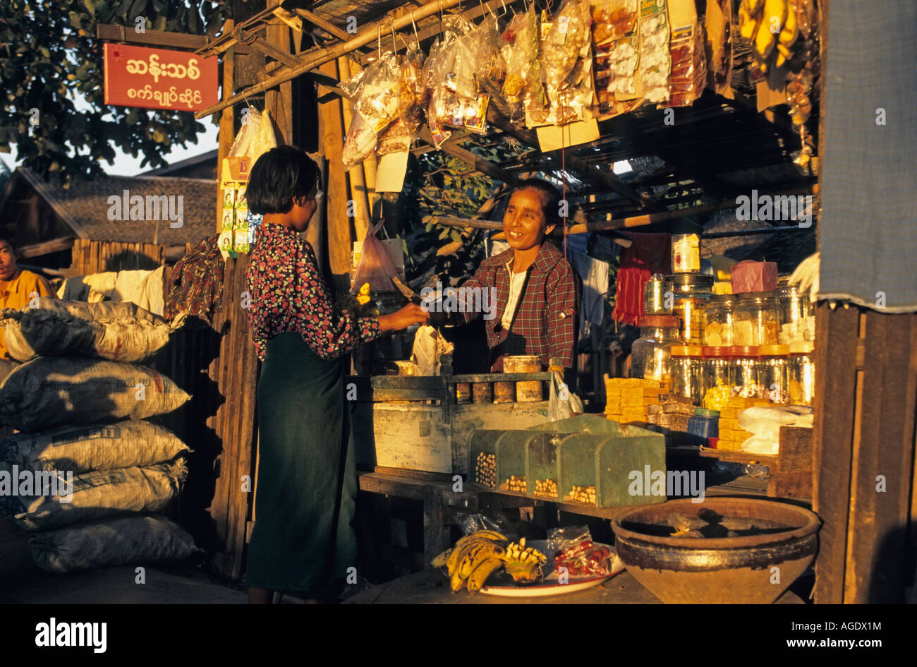 Myanmar, Mandalay, People at shop Stock Photo - Alamy