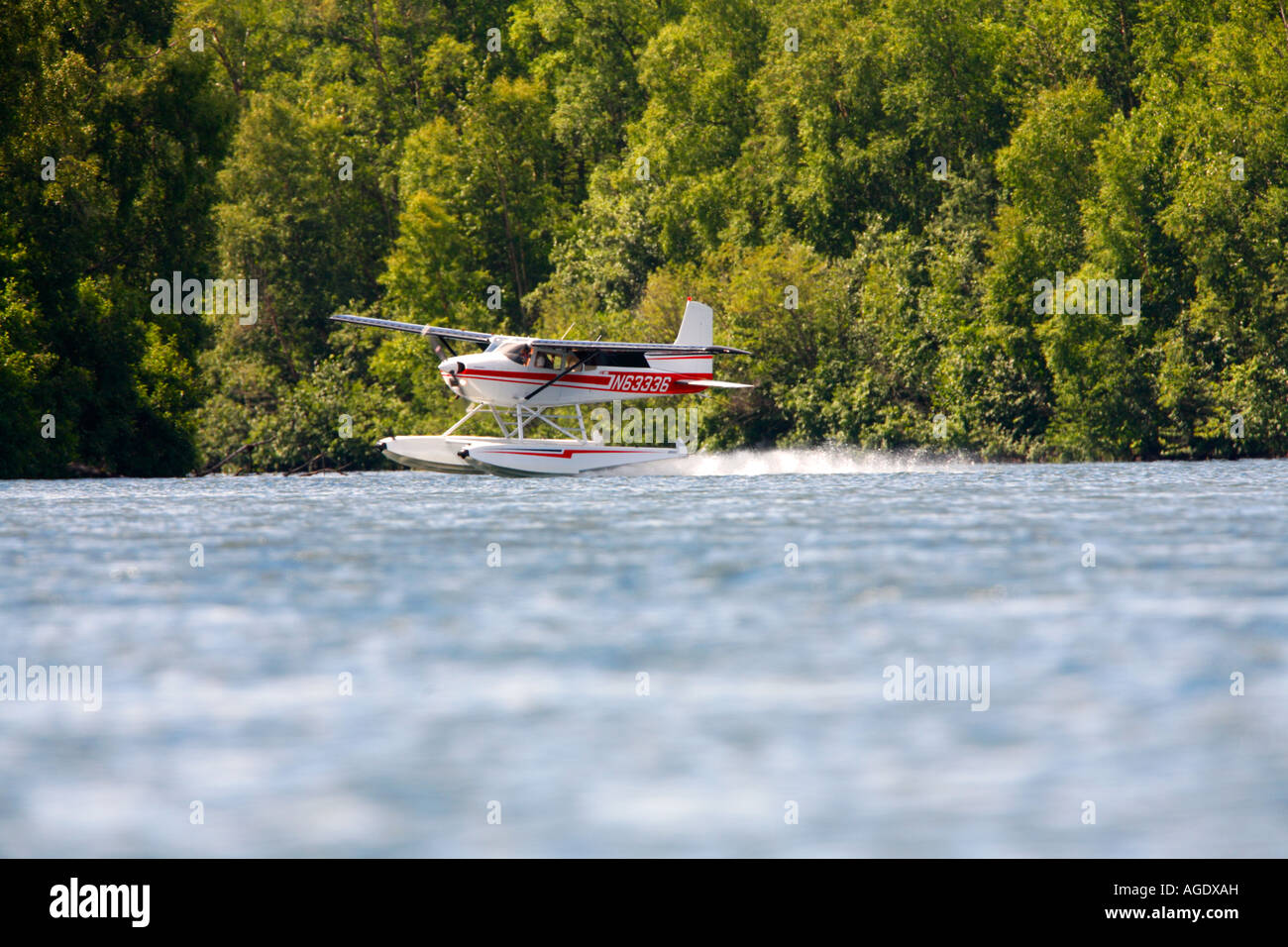 Float plane landing at Finger Lake Wasilla Alaska Stock Photo - Alamy