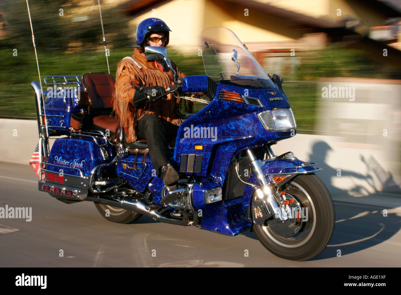 Biker riding motorcycle low angle hi-res stock photography and images ...