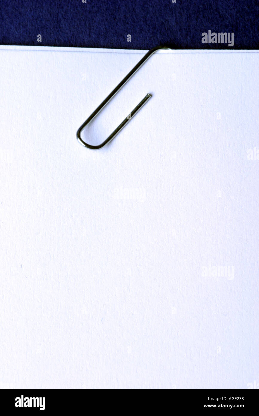 Paperclip holding paper together hi-res stock photography and images ...