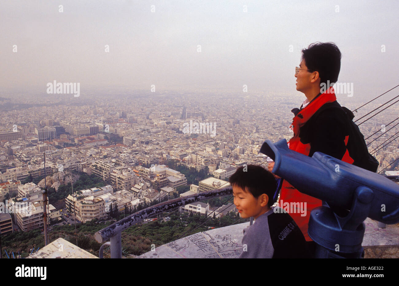 Greece Athens Japanese tourists looking over the city of Athens from ...