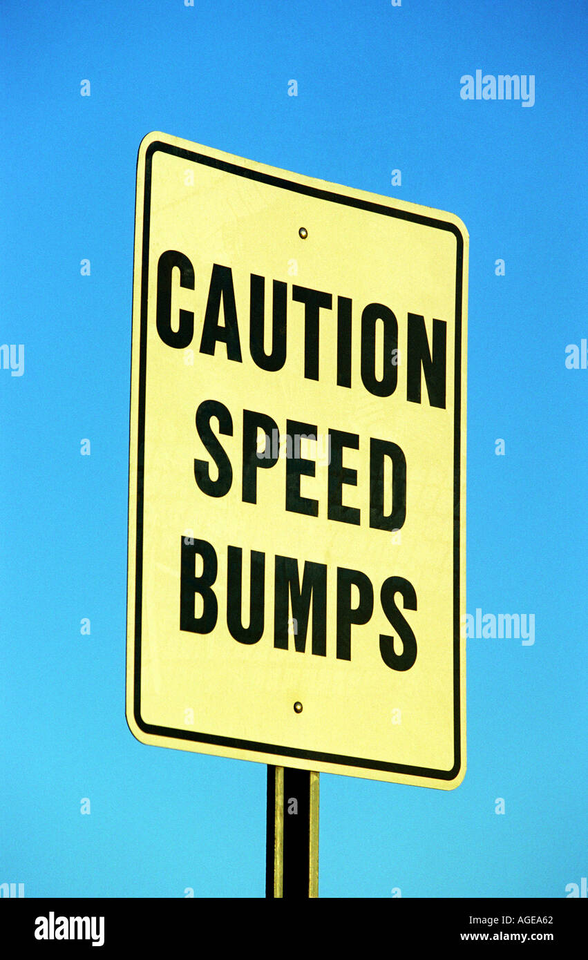 Caution Speed Bumps sign USA Stock Photo - Alamy
